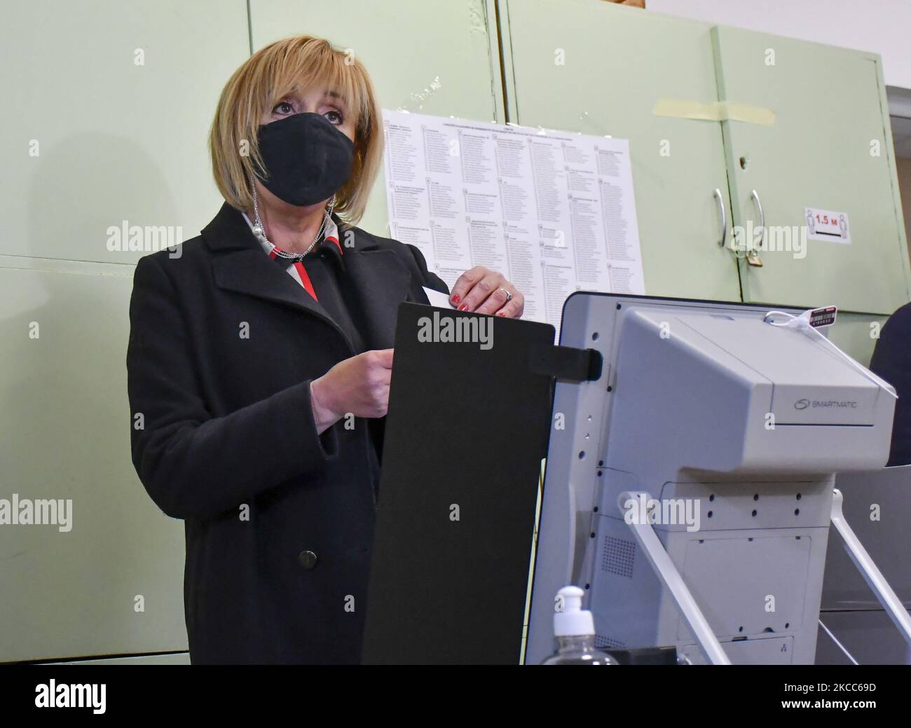 Leader of opposition party "Stand up" Maya Manolova casts his ballot at ...