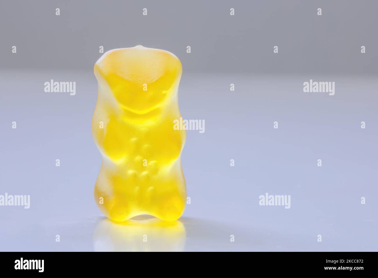 A Yellow gummy bear candy fruity flavours Stock Photo - Alamy