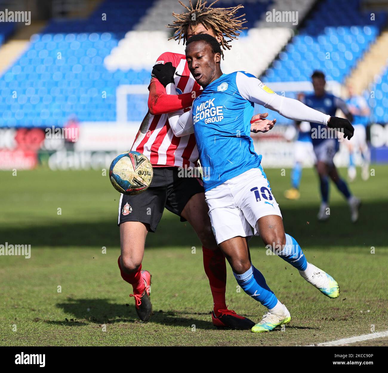 Siriki Dembele of Peterborough United and Dion Sanderson of Sunderland ...