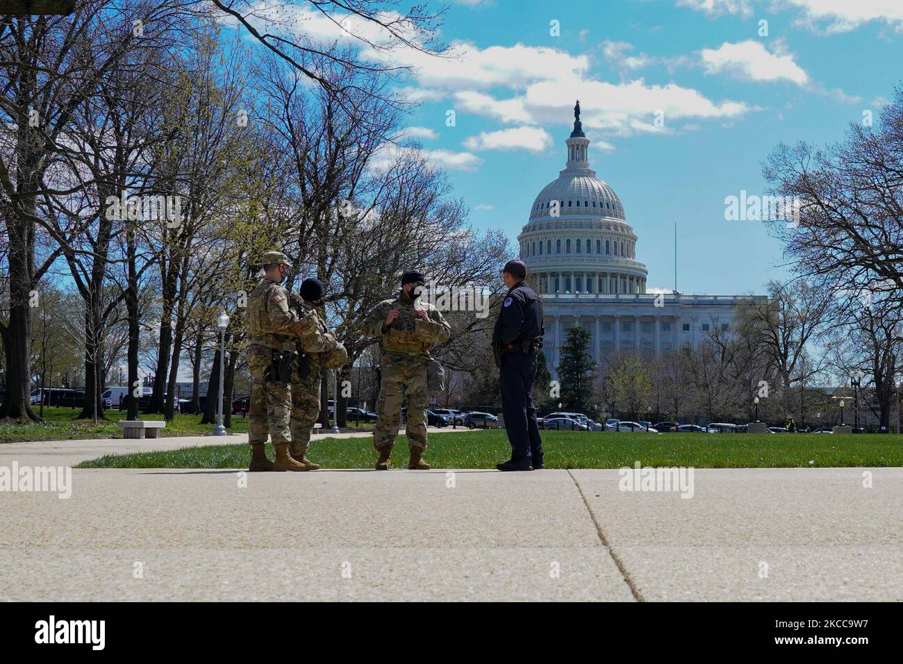 Members of US Capitol police and national guard block the road to ...