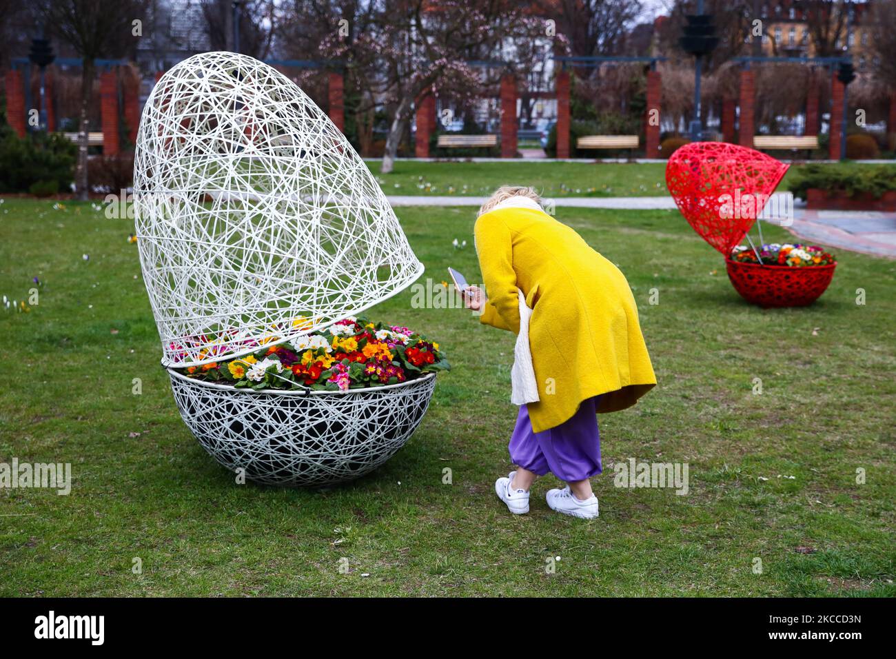 Easter eggs decorations with spring flowers are seen at Doncaster ...