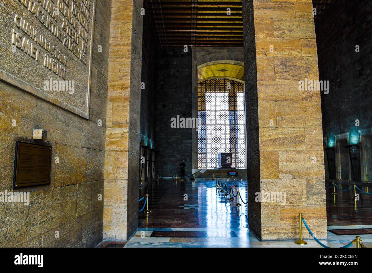 A Turkish soldier wearing a protective face mask stands guard at ...