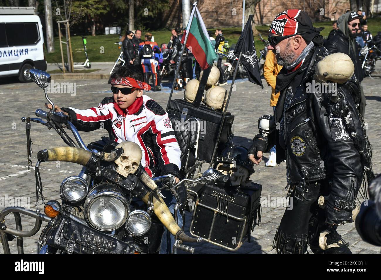 Boy on motorcycle during the opening of motorcycle season in downtown ...