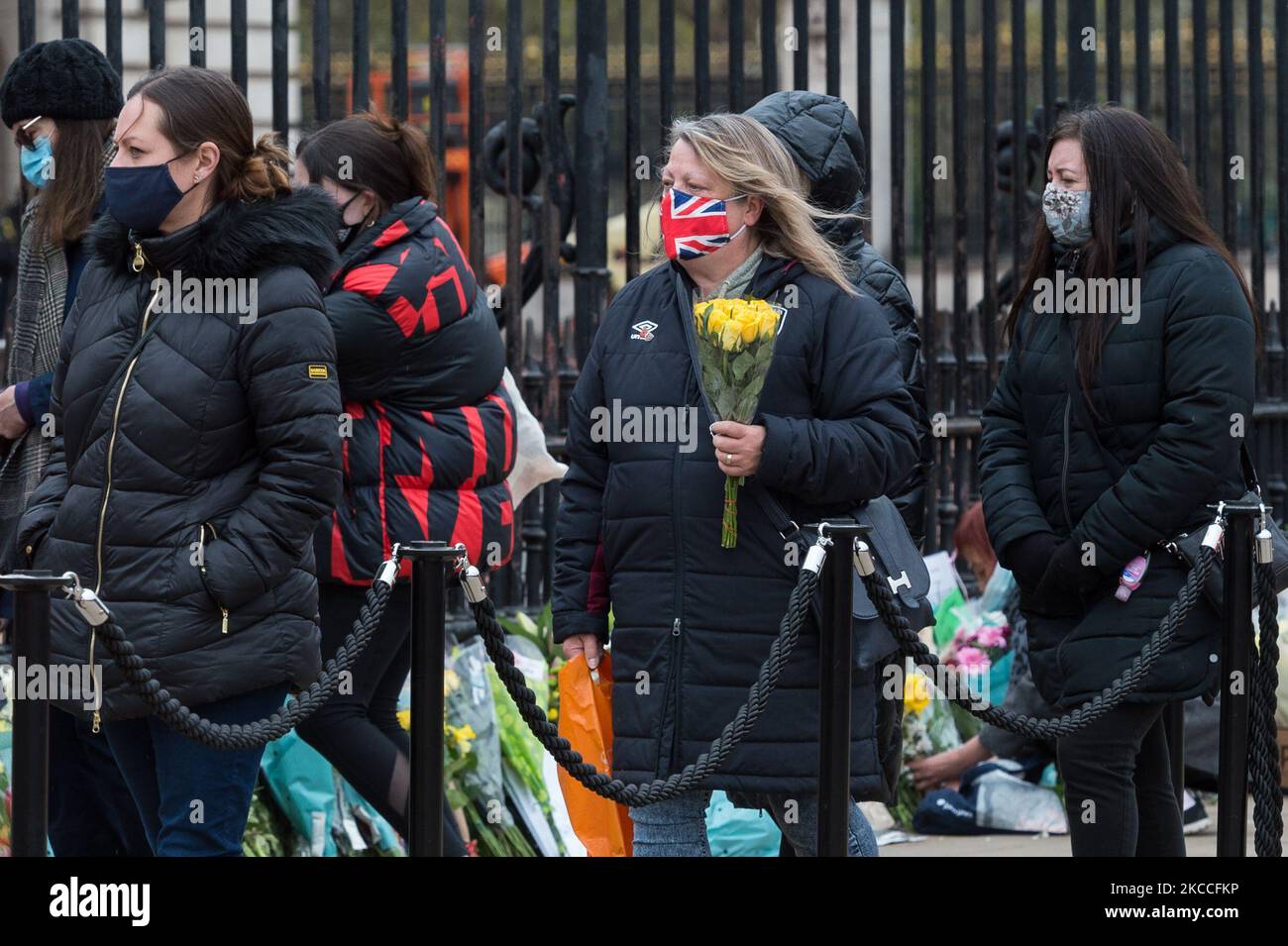A woman wearing a face mask in edinburgh hi-res stock photography and ...