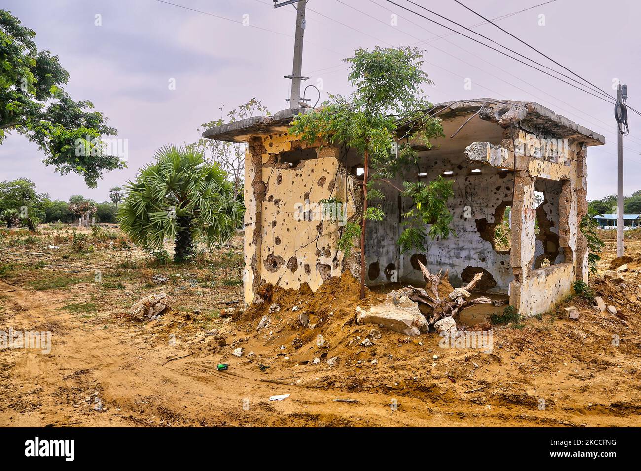 Remains of a building riddled with bullet holes during the civil war in ...