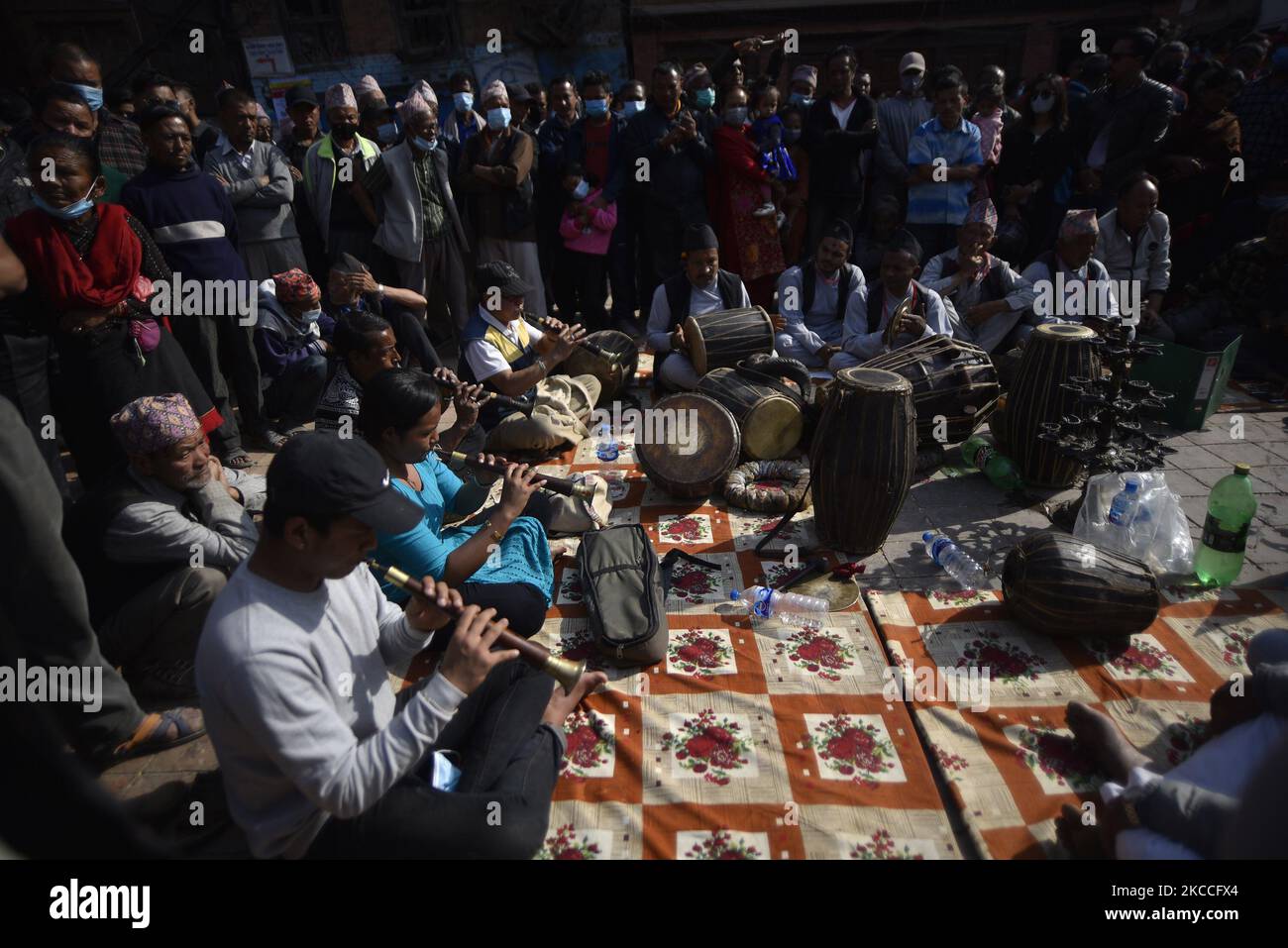 Devotees playing traditional instruments during the first day of the ...