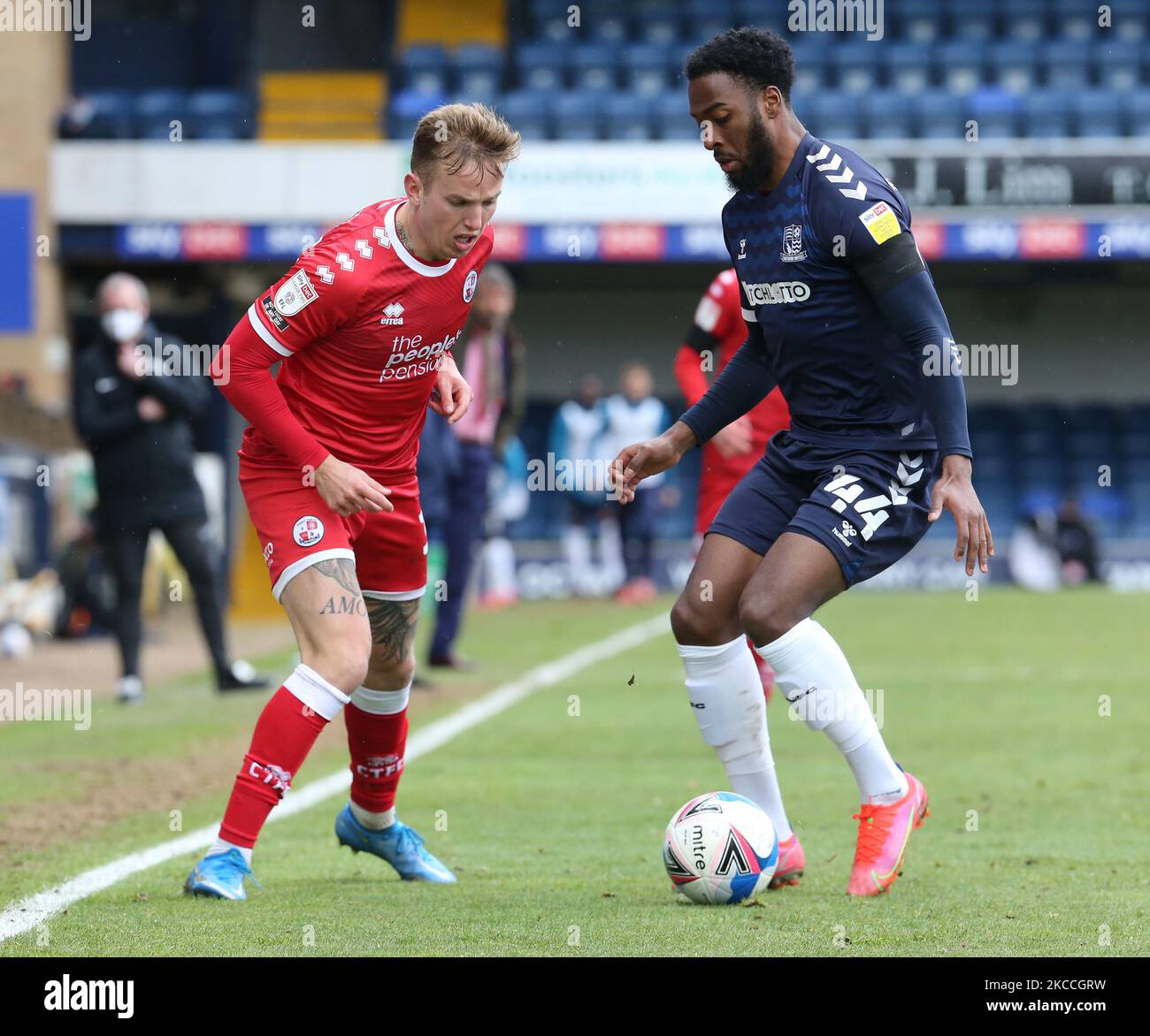 L-R Jordan Maquire-Drew of Crawley Town and Nathan Ferguson of Southend ...