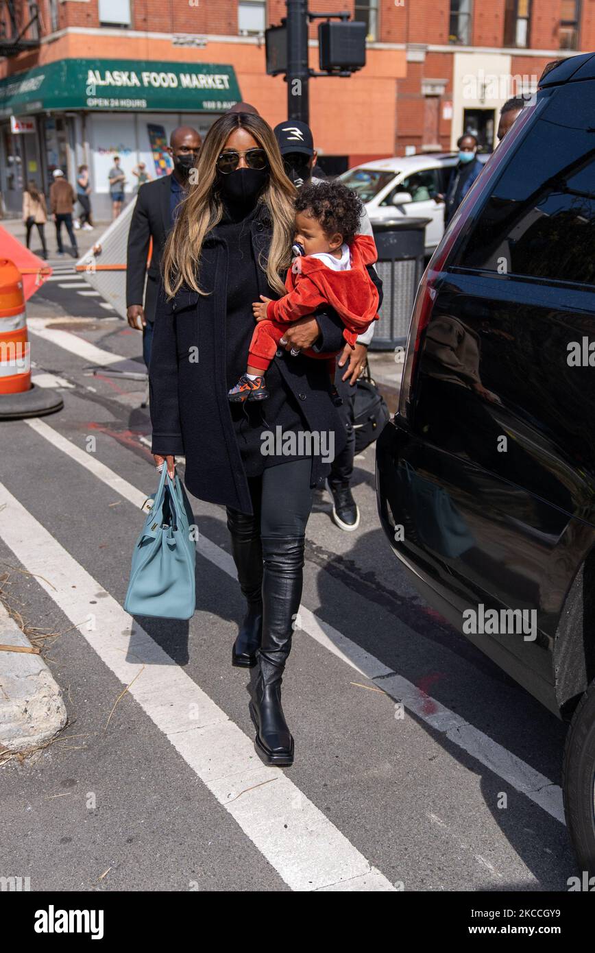 NFL Player Russel Wilson and singer Ciara is seen clutching son Win ...