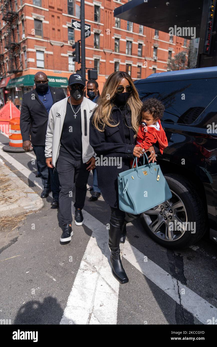 NFL Player Russel Wilson and singer Ciara is seen clutching son Win ...