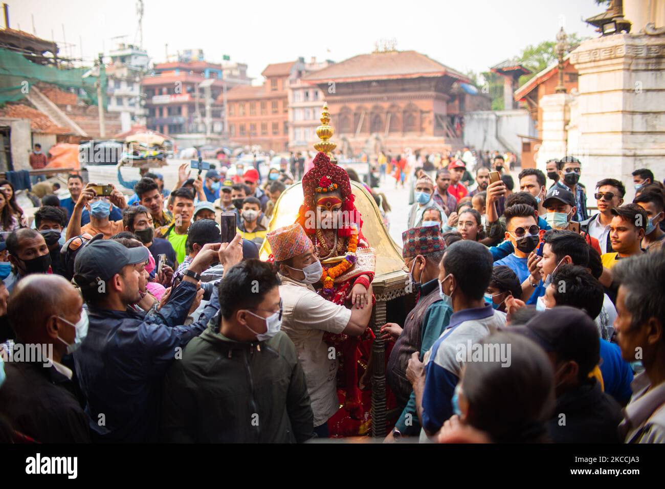 Nepal's Living Goddess, also known as Kumari is carried by devotees ...