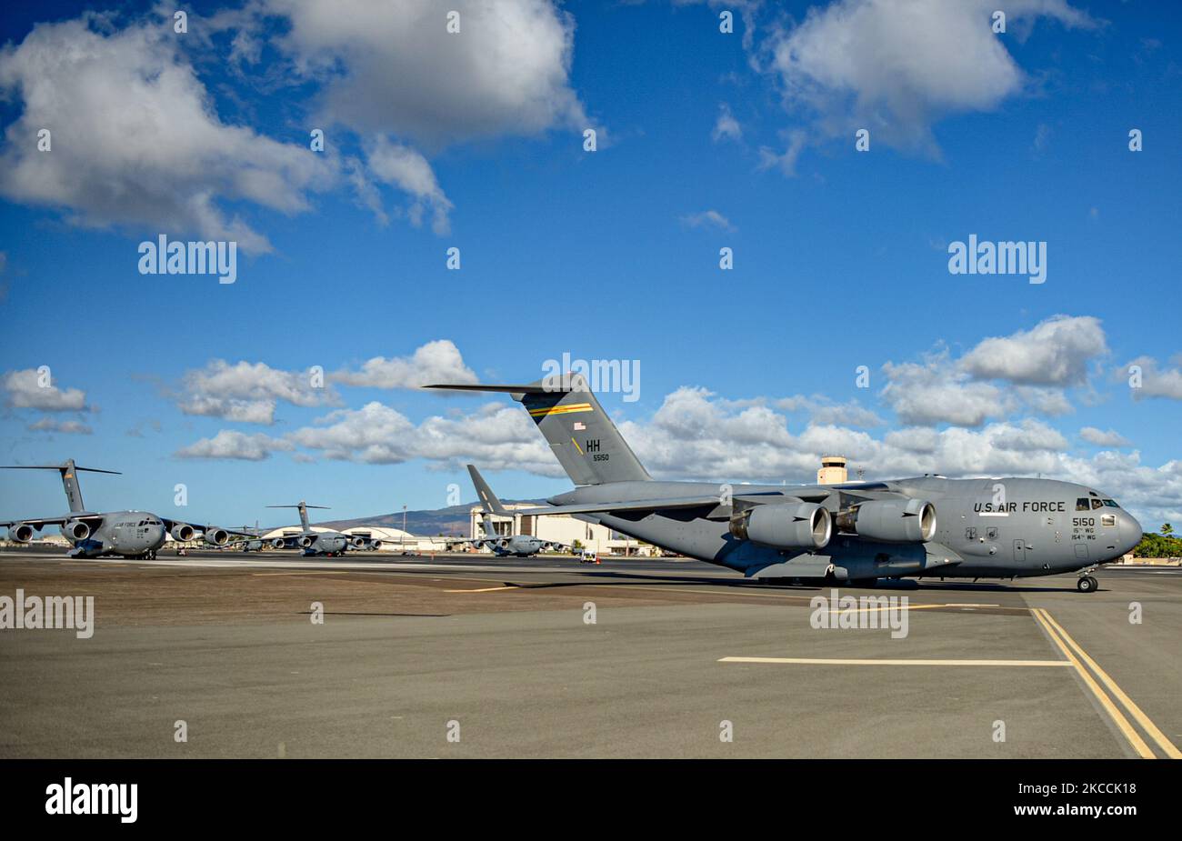 U.S. Air Force C-17 Globemaster III leads the four-ship formation of C ...