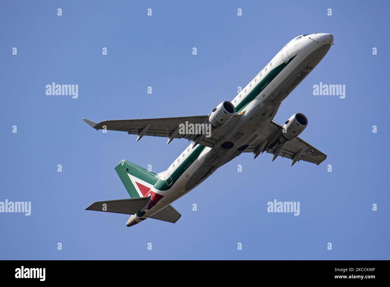 Alitalia Cityliner Embraer ERJ-175 aircraft as seen during takeoff and ...