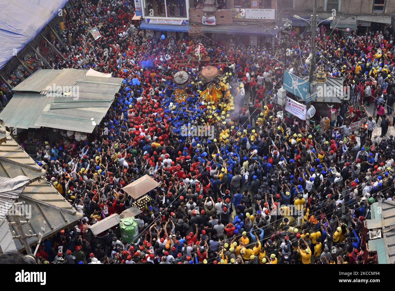 Nepalese devotees carrying the chariot and rotate during the ...