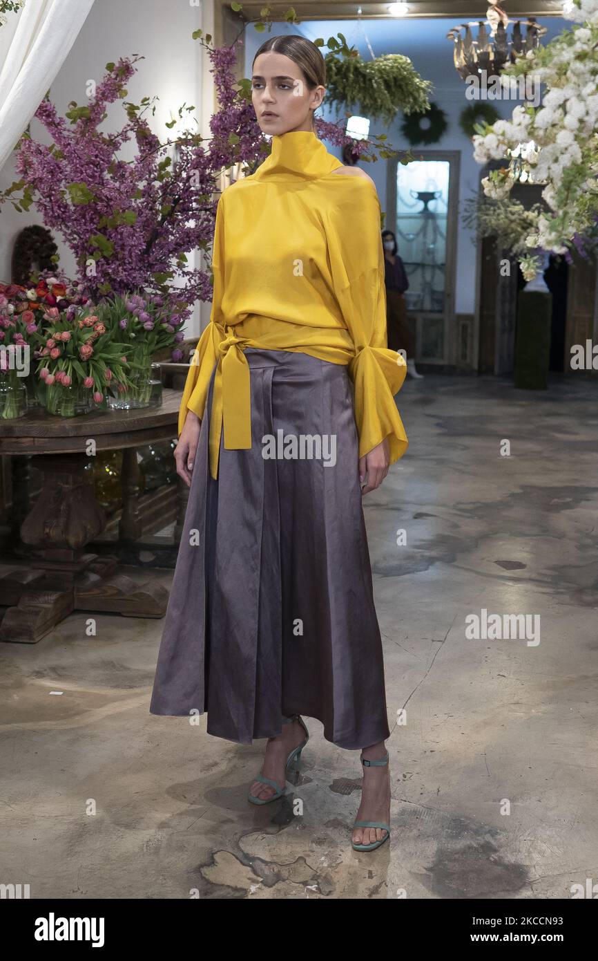 A model walks the runway at the Juanjo Oliva Fashion Week Madrid show ...