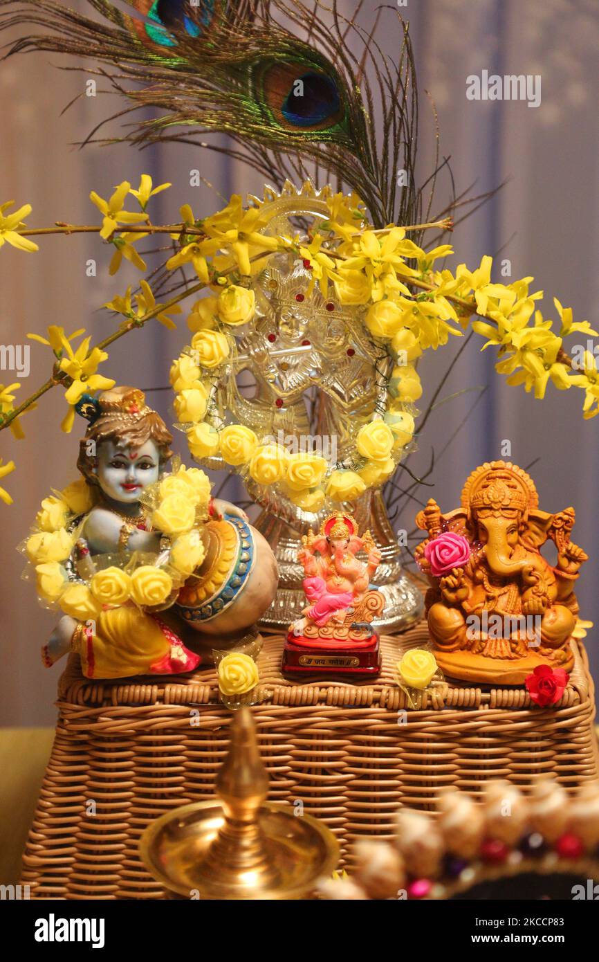 Traditional Vishu kani (Vishukani) setting with a small idol of Lord ...