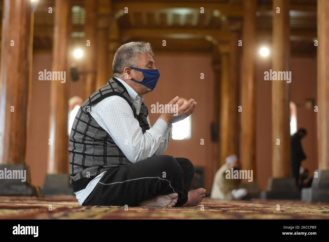 A Kashmiri man prays on the first day of Ramadan in Kashmir's grand ...