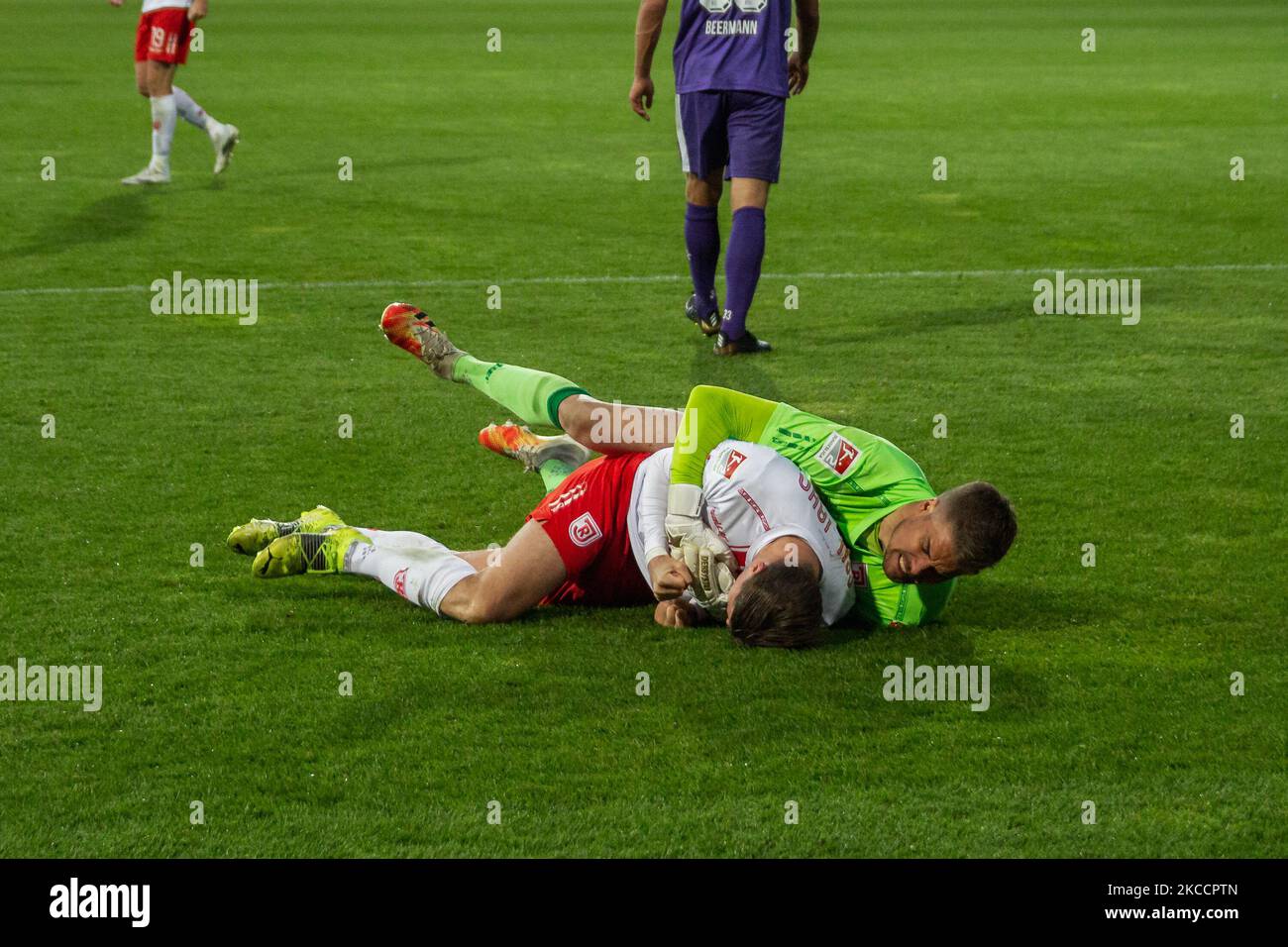 Goalkeeper Alexander Meyer (right) and Jan Elvedi (left) of SSV Jahn ...