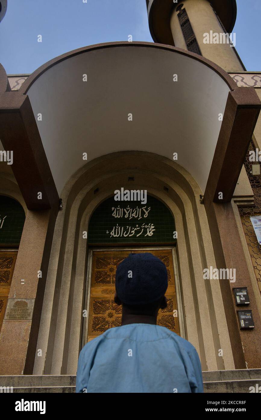 A boy stand at the entrance of the Lagos Central Mosque (Lagos Island ...