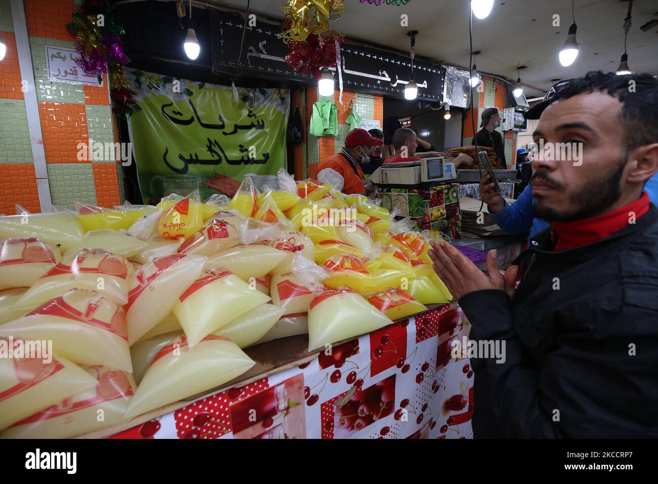 A man from Algeria sells a special dessert known as "zalabia" and lemon ...