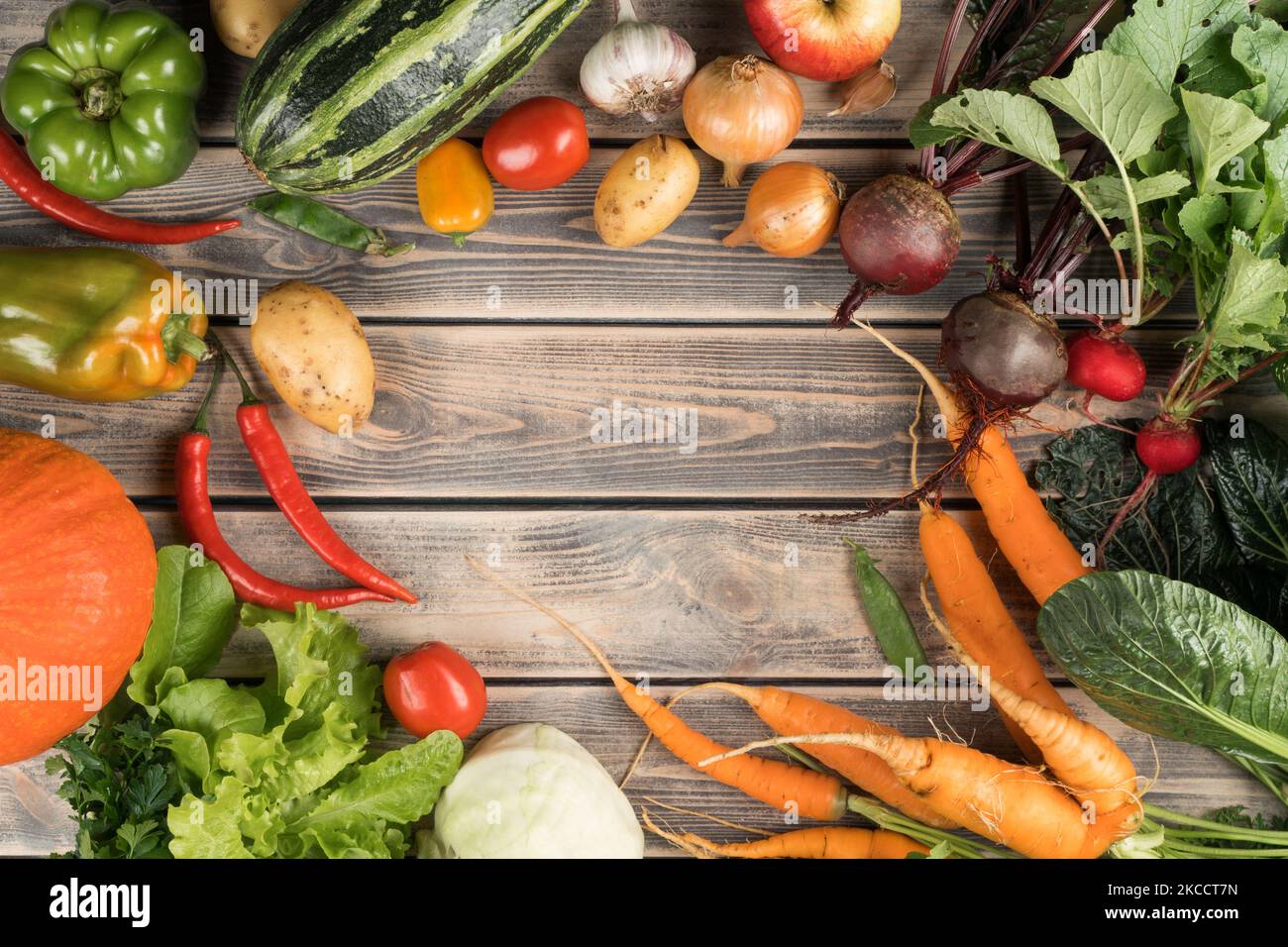 Colorful mix of fresh farm vegetables and fruits, top view. Sorting ...