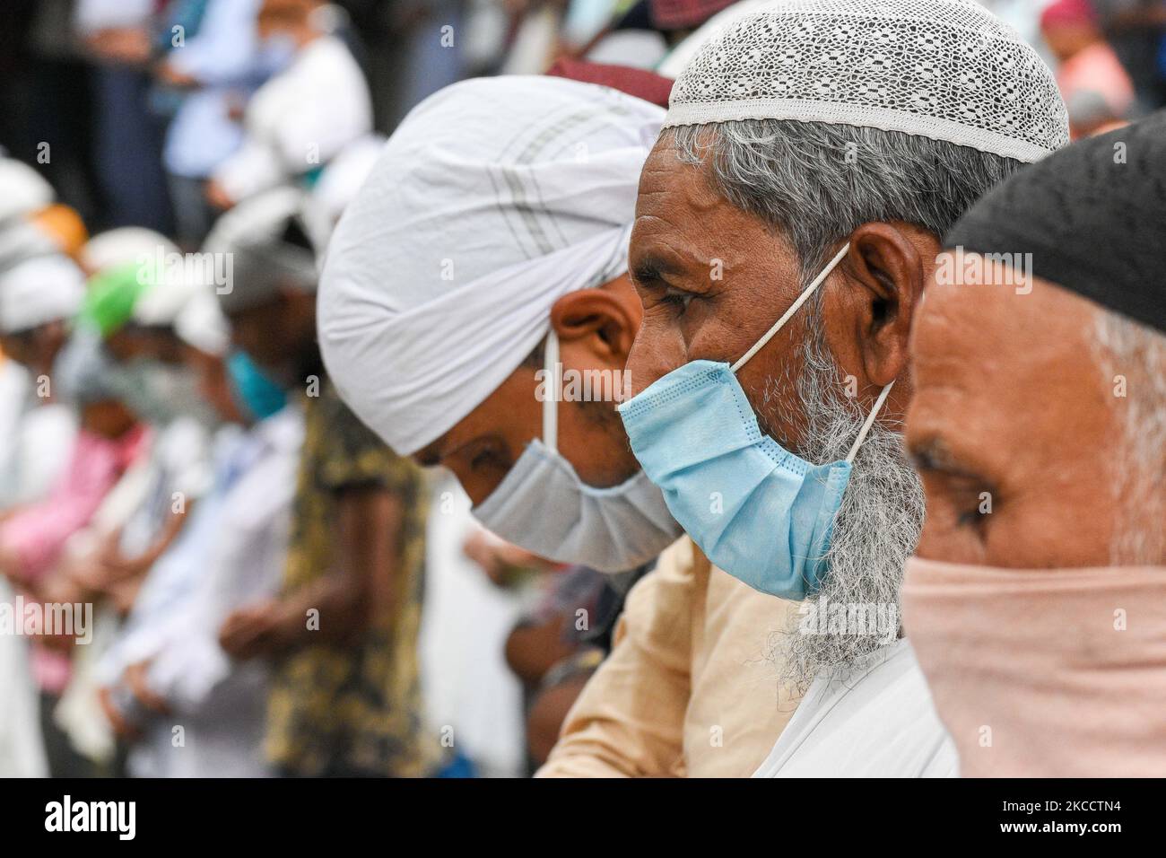People are seen wearing mask during a Ramadan prayer at a mosque in ...