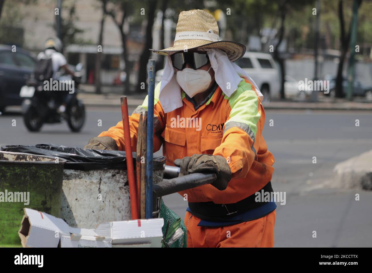 A cleaning worker on Reforma Avenue in Mexico City, during the health ...