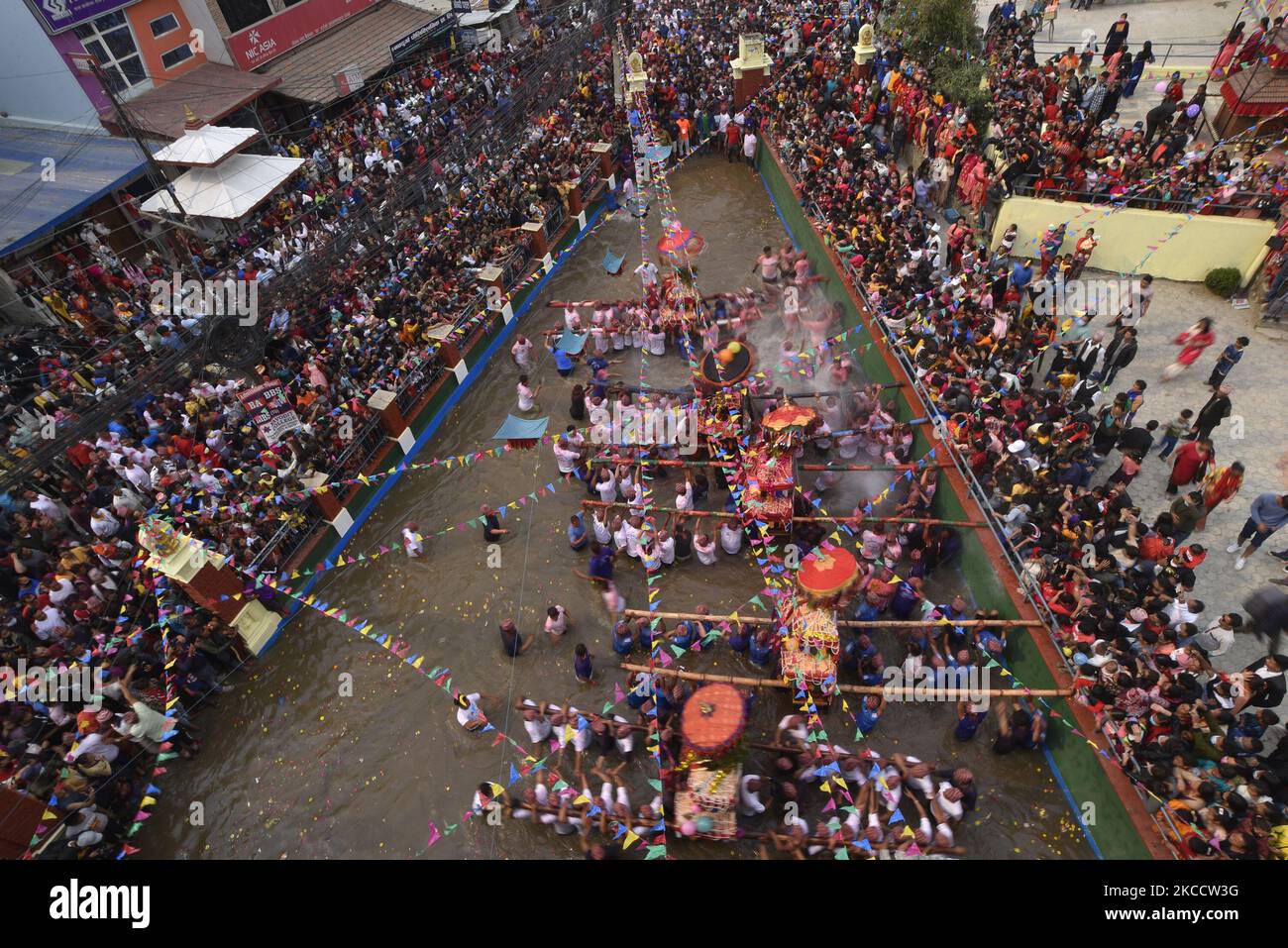 Nepalese Devotees enjoy by splashing water towards each other as ...