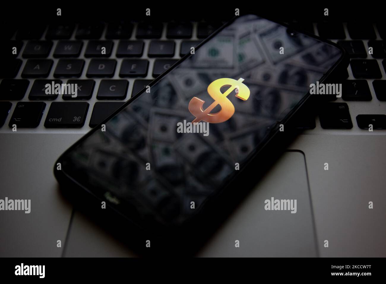 In this photo illustration Dollar logo is displayed on a smartphone ...