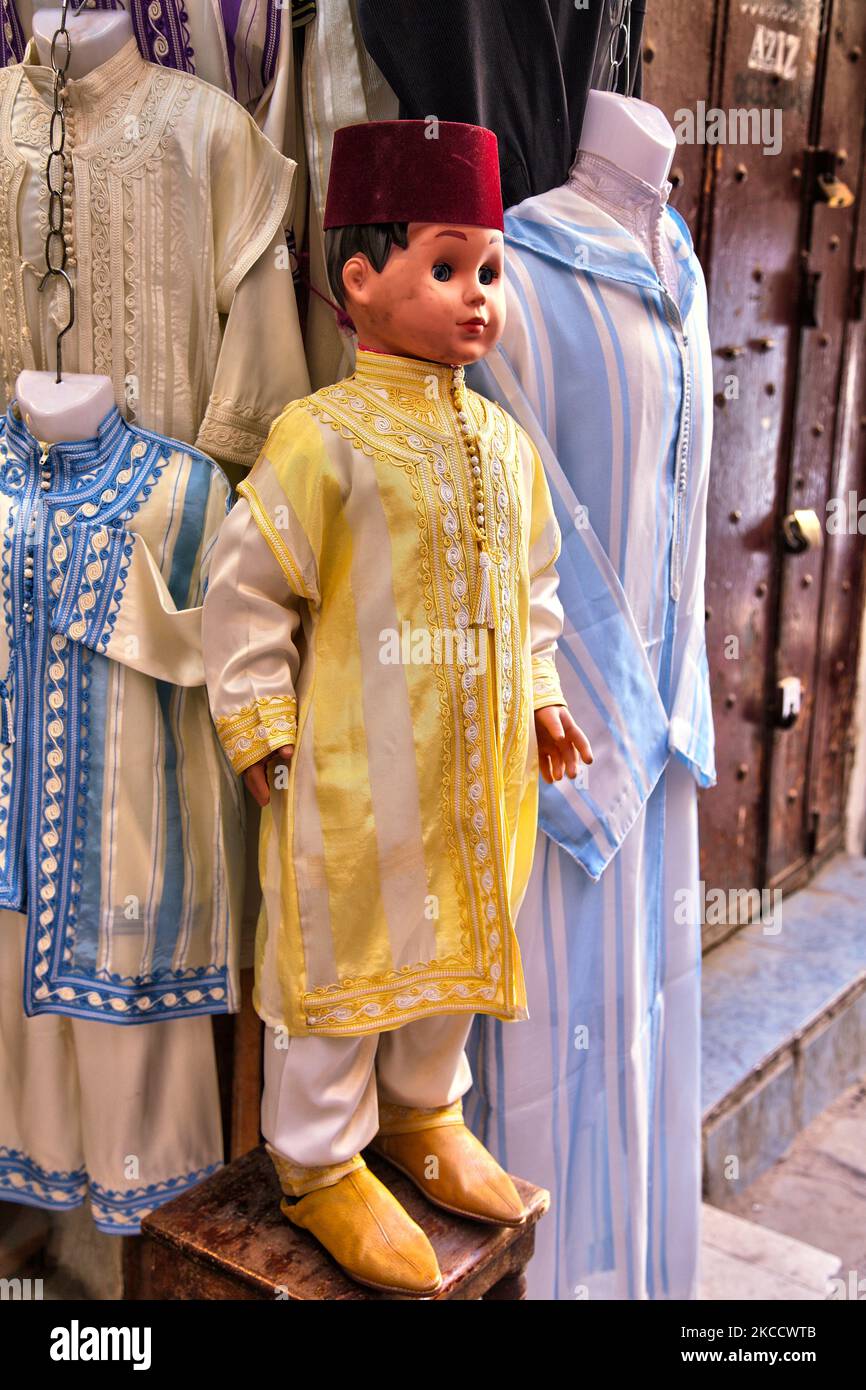 Mannequin displaying traditional clothing outsidea shop in the textile ...