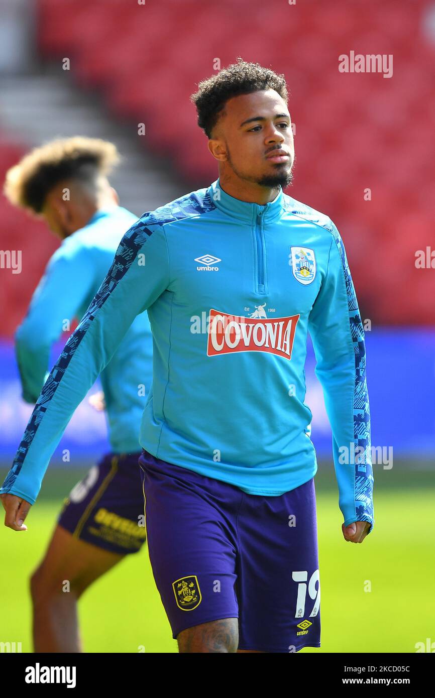 Josh Koroma of Huddersfield Town warms up ahead of kick-off during the ...