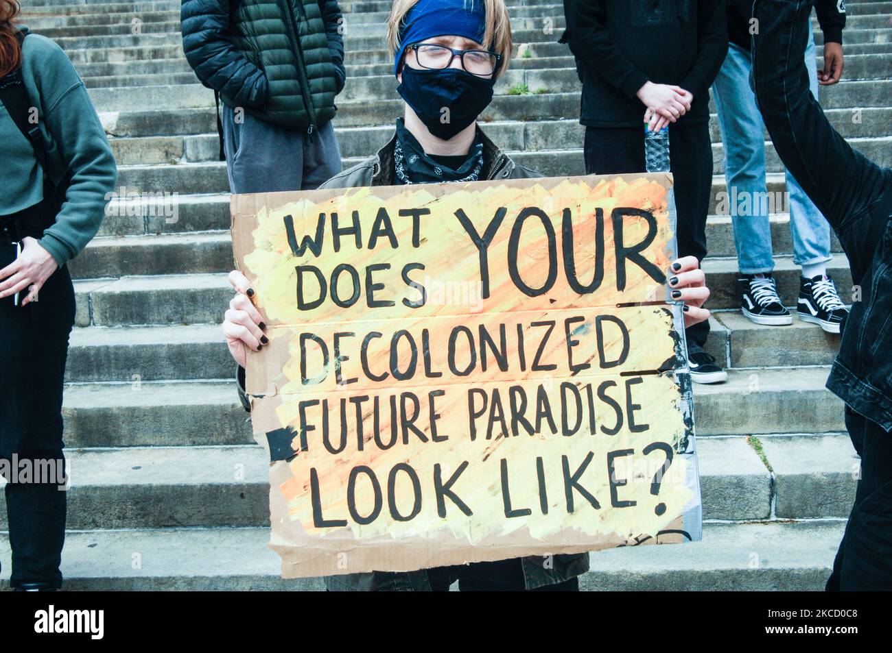 A young man asks what decolonization looks like on the steps of the ...