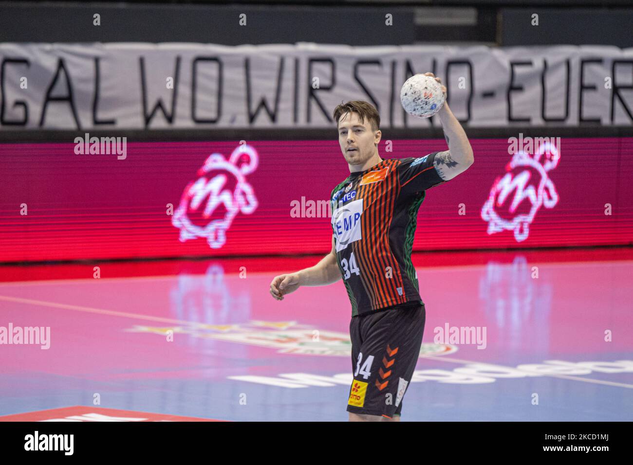 Michael Damgaard of SC Magdeburg control the ball during the LIQUI MOLY ...