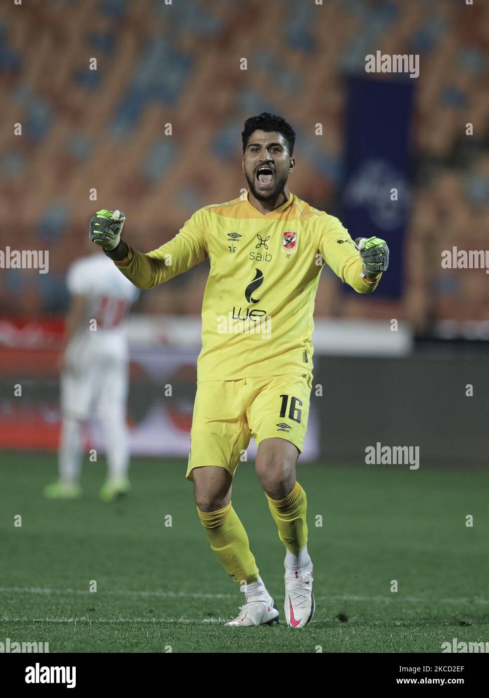 Goalkeeper Aly lotfy of Al Ahly SC gestures After saved the pinalty ...