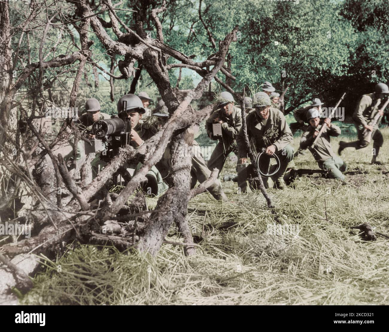 U.S. Army machine gun crew protecting advancing foot soldiers, circa ...