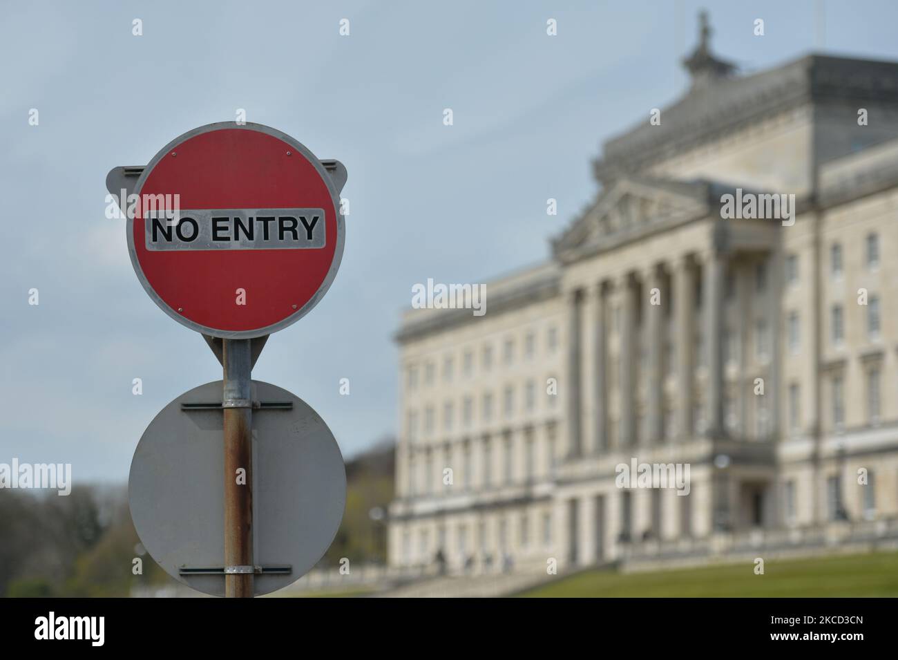 A sign 'No Entry' with a background view of Stormont, the Northern ...