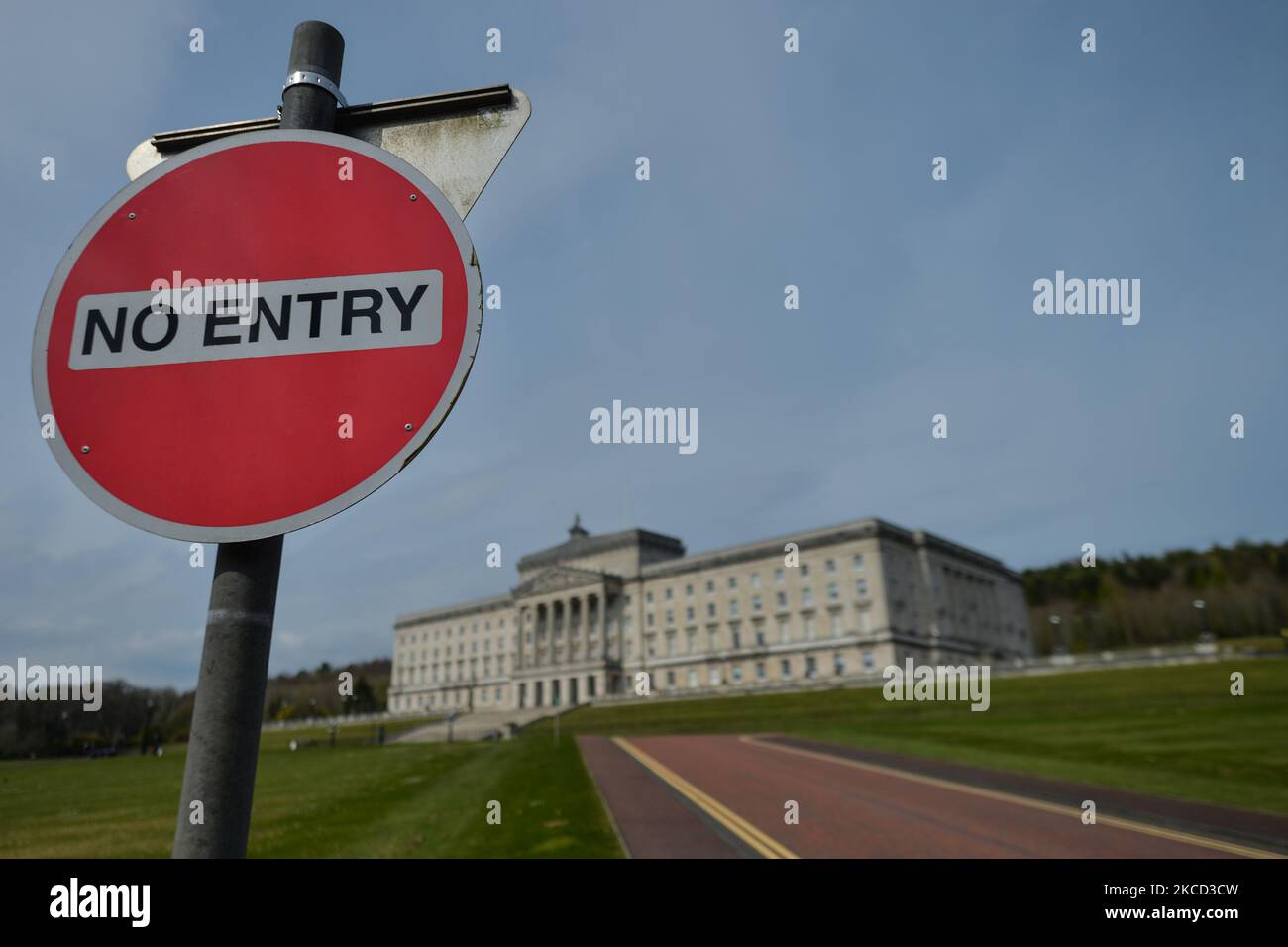 A sign 'No Entry' with a background view of Stormont, the Northern ...