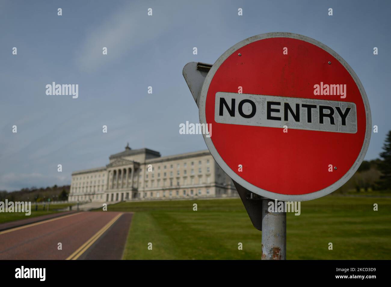 A sign 'No Entry' with a background view of Stormont, the Northern ...