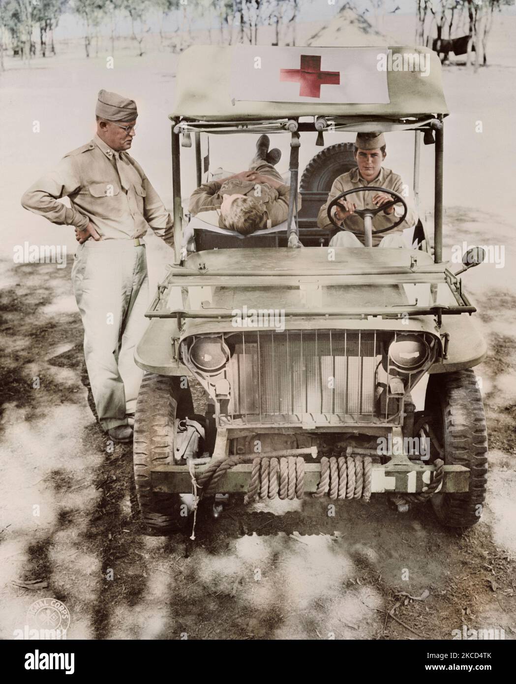 Captain Nelson inspecting a half-ton jeep with a permanent metal frame ...