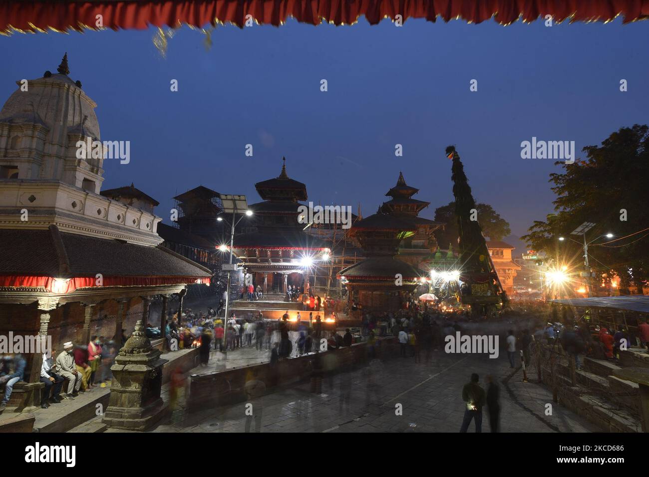 Nepalese Devotees offering rituals in front chariot during celebration ...