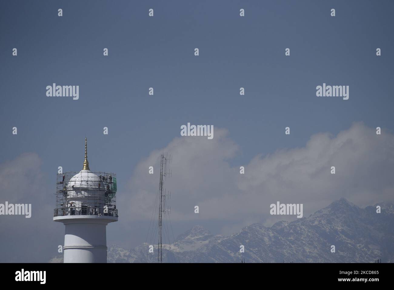 A view of newly constructed historic Dharahara tower along with Mount ...