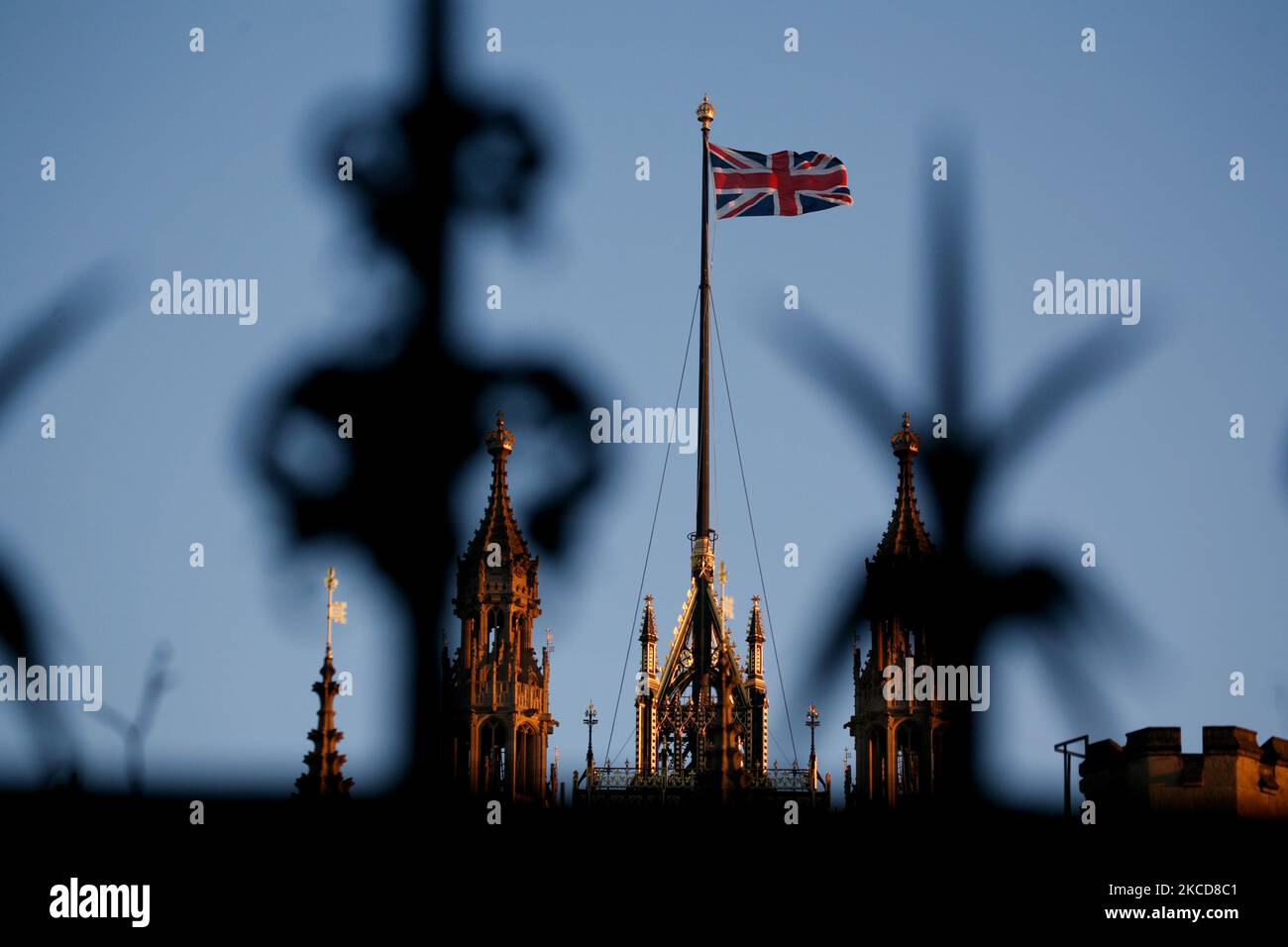 A Union flag flies from the top of the Victoria Tower of the Houses of ...