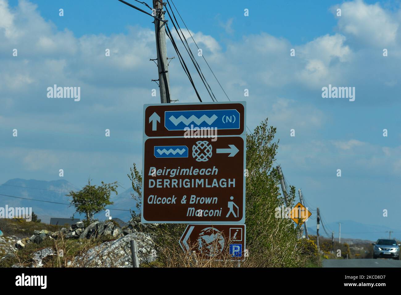 A view the Wild Atlantic Way road signs seen on the road to Clifden, in ...