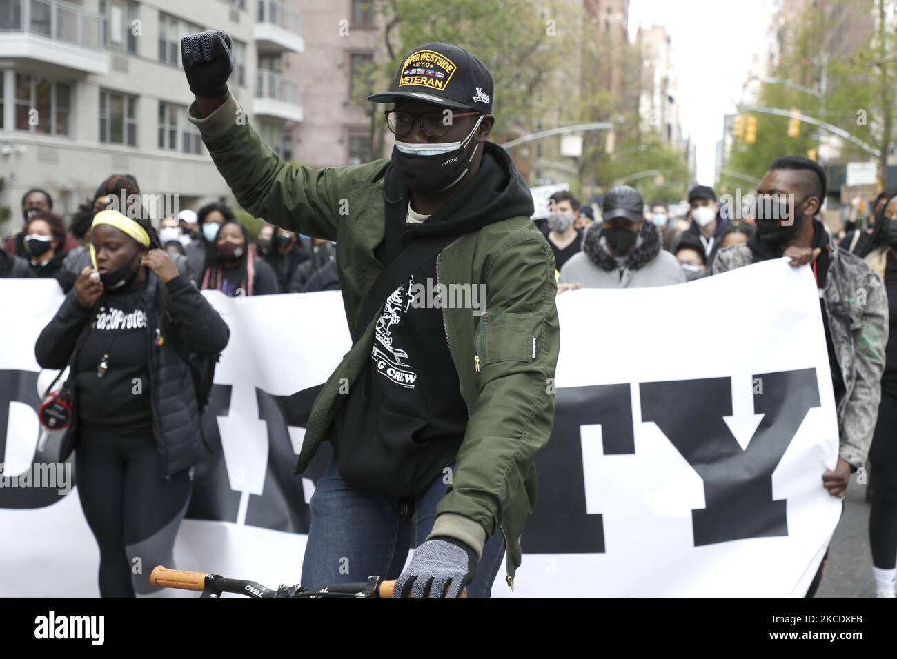 Demonstrators march through the streets against racism and inequality ...