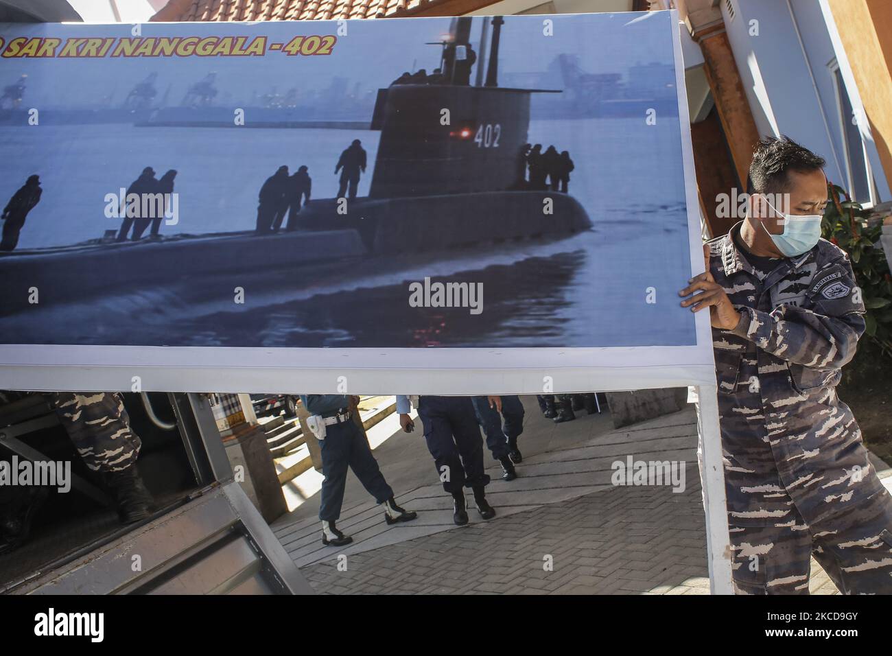 Indonesian navy officer prepares at rescue command centre for missing ...