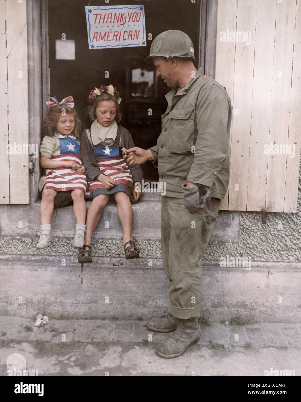 Soldier giving candy to children hi-res stock photography and images ...
