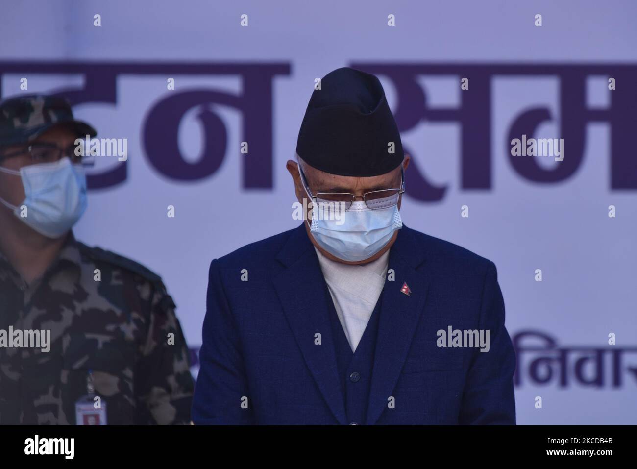 Prime Minister of Nepal KP Sharma Oli bow head for a minute of silence ...