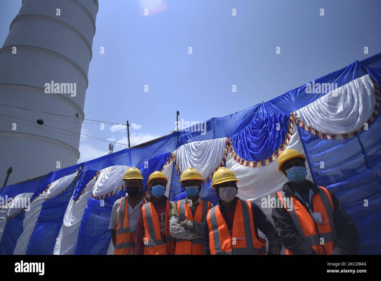 Nepalese workers attends inauguration of newly constructed Dharahara in ...