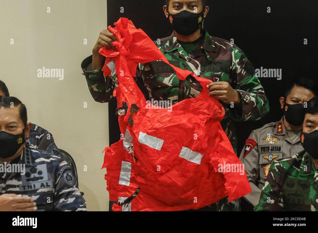 Ripped crew escape suit hi-res stock photography and images - Alamy