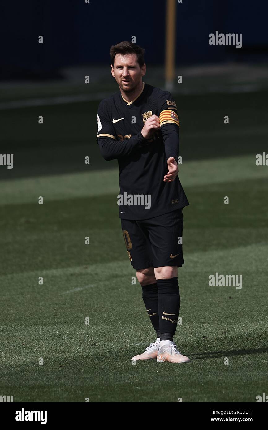 Lionel Messi of Barcelona puts on the captain's armband during the La ...