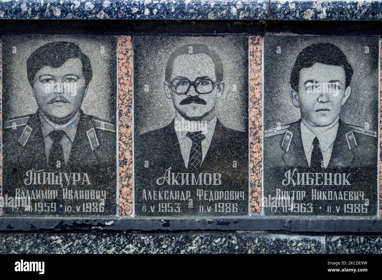 Tombstones of three workers of the Chernobyl Nuclear Plant dead by the ...